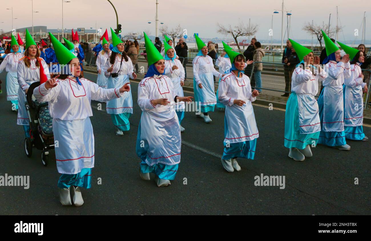 Evening carnival parade with dancing group of girls in the Spanish ...
