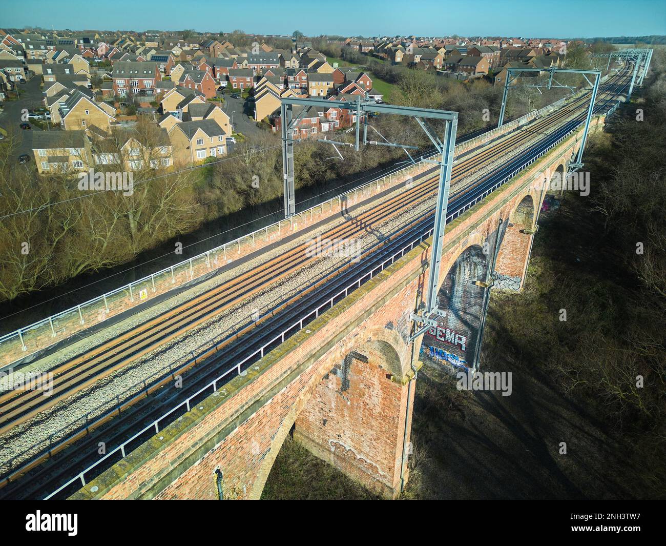 Aerial view of the victorian brick built railway viaduct at Corby ...