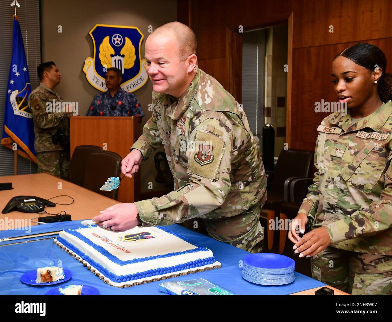 Chief Master Sgt. Paul Miller, 926th Wing command chief, and Senior Airman Elizabeth Mosley ...