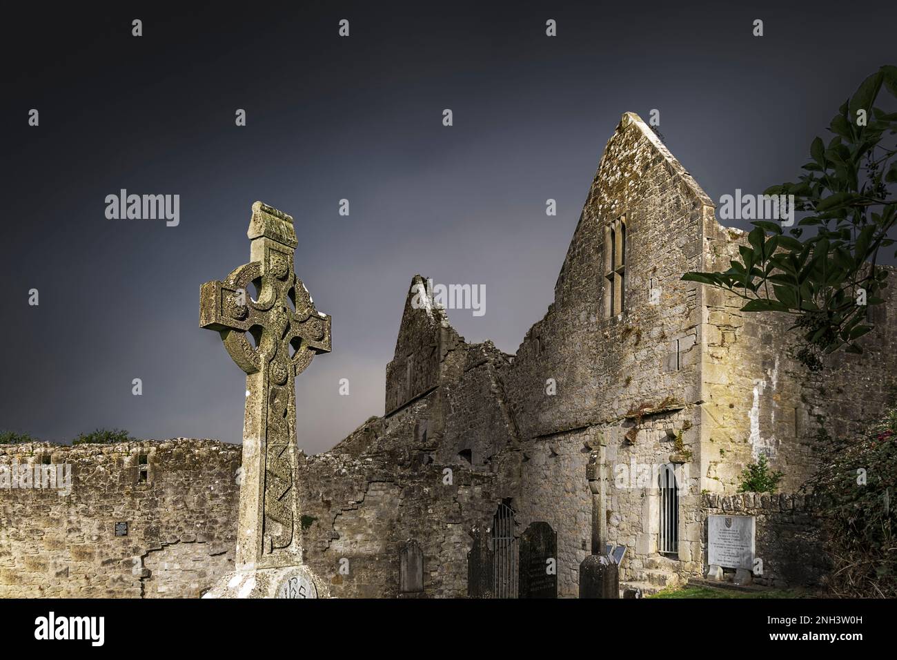 Celtic Cross at ruins of Askeaton Franciscan Friary on River Deel in ...