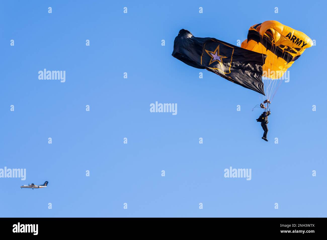 Sgt. Daniel McKeon of the U.S. Army Parachute Team makes a parachute ...