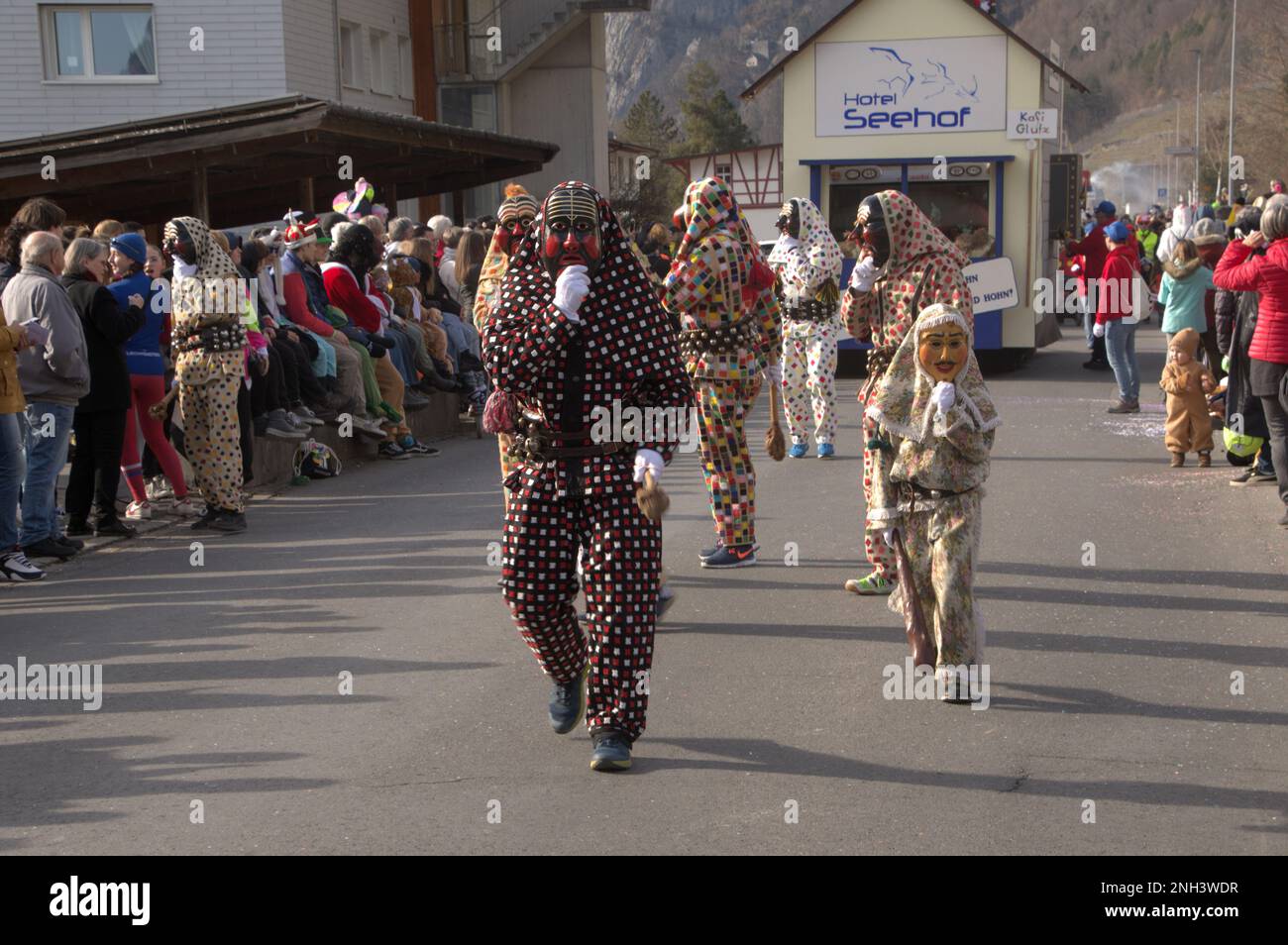 Fool costumes at th e Walenstadt Fasnacht procession in the Swiss Alps ...