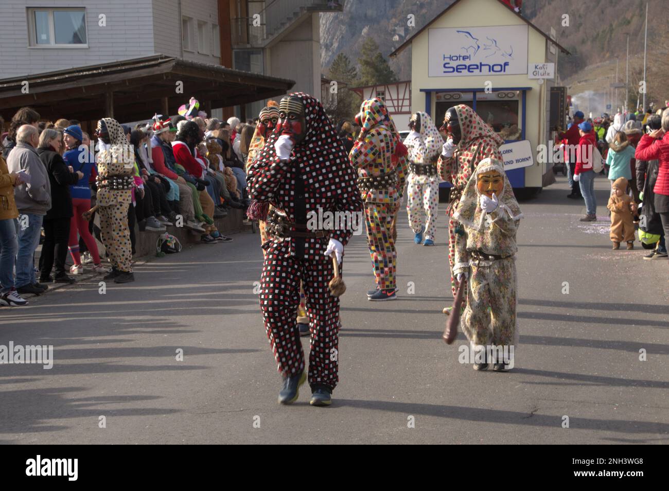 Fool costumes at th e Walenstadt Fasnacht procession in the Swiss Alps ...