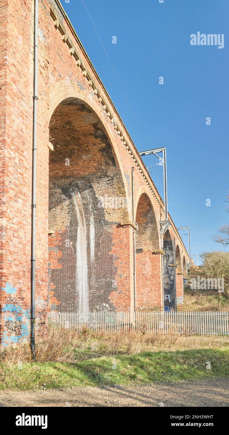Arches of the victorian brick built railway viaduct at Corby, England ...
