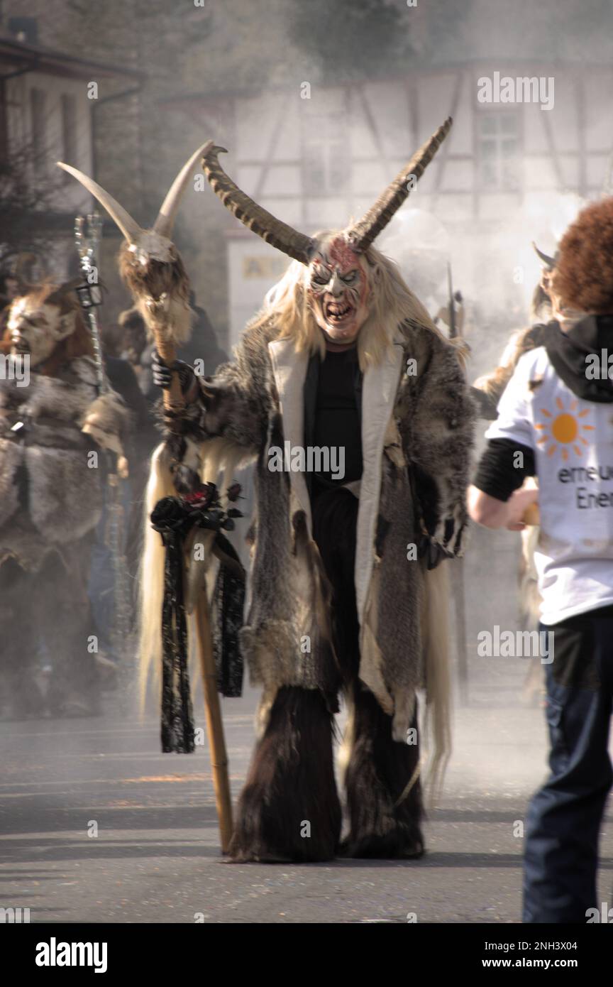 Demon costume at the Walenstadt Fasnacht procession in the Swiss Alps ...