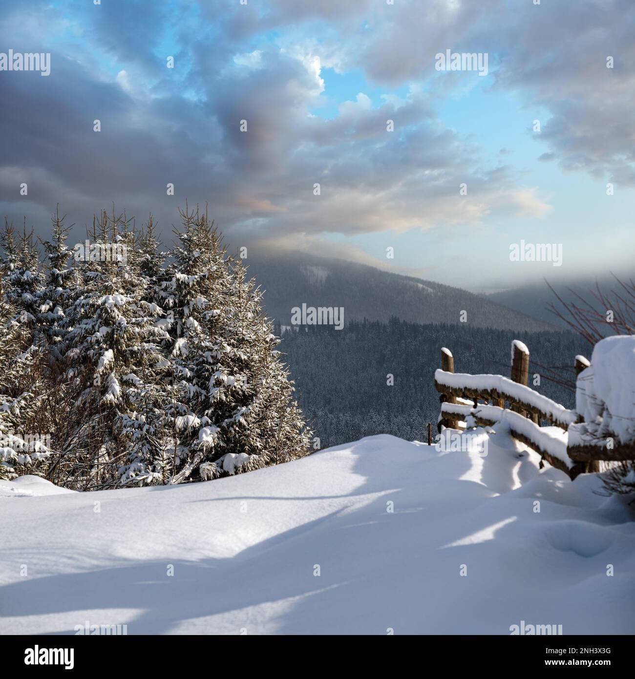 Winter remote alpine mountain village outskirts, countryside hills ...