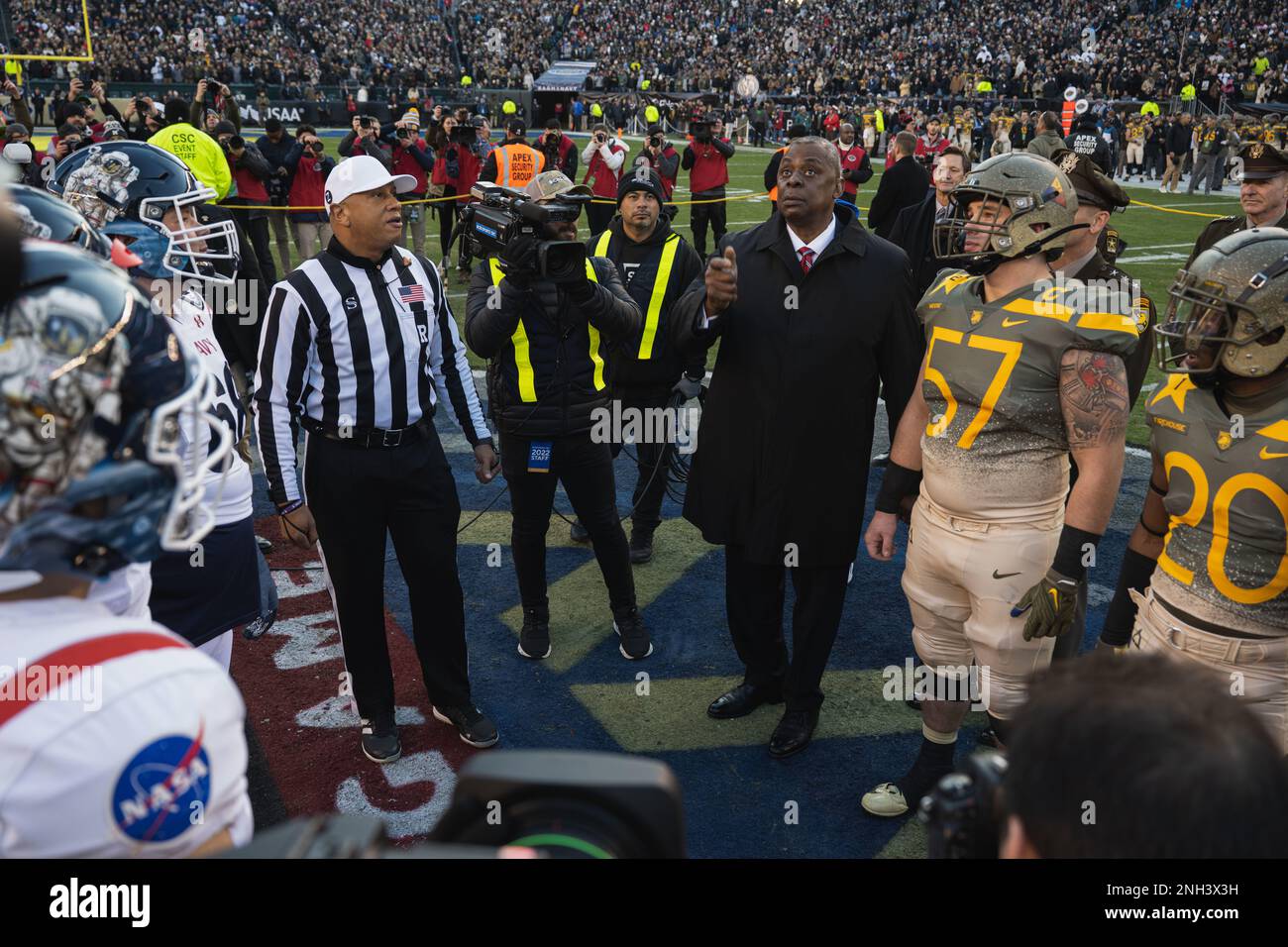 Secretary of Defense Lloyd J. Austin III participates in the coin toss ...