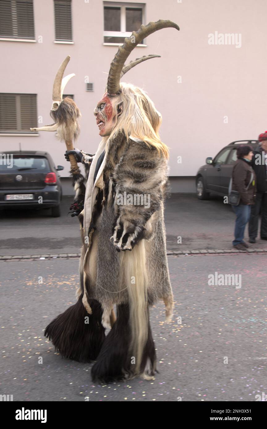 Demon costume at the Walenstadt Fasnacht procession in the Swiss Alps ...