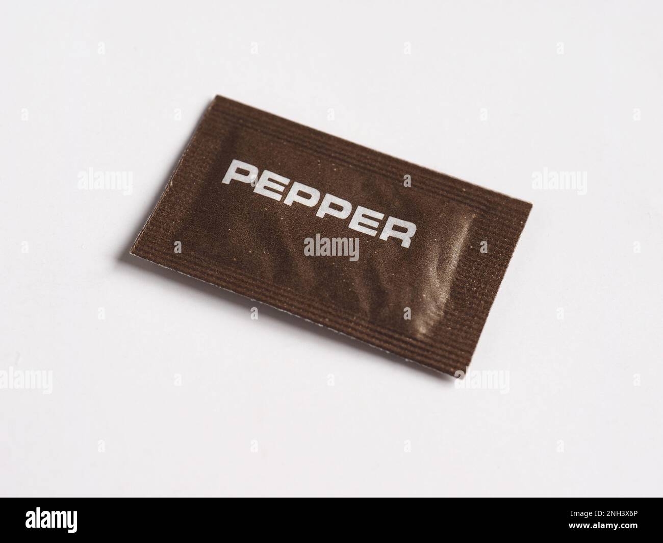 single dose pepper sachet for restaurants and pubs Stock Photo - Alamy