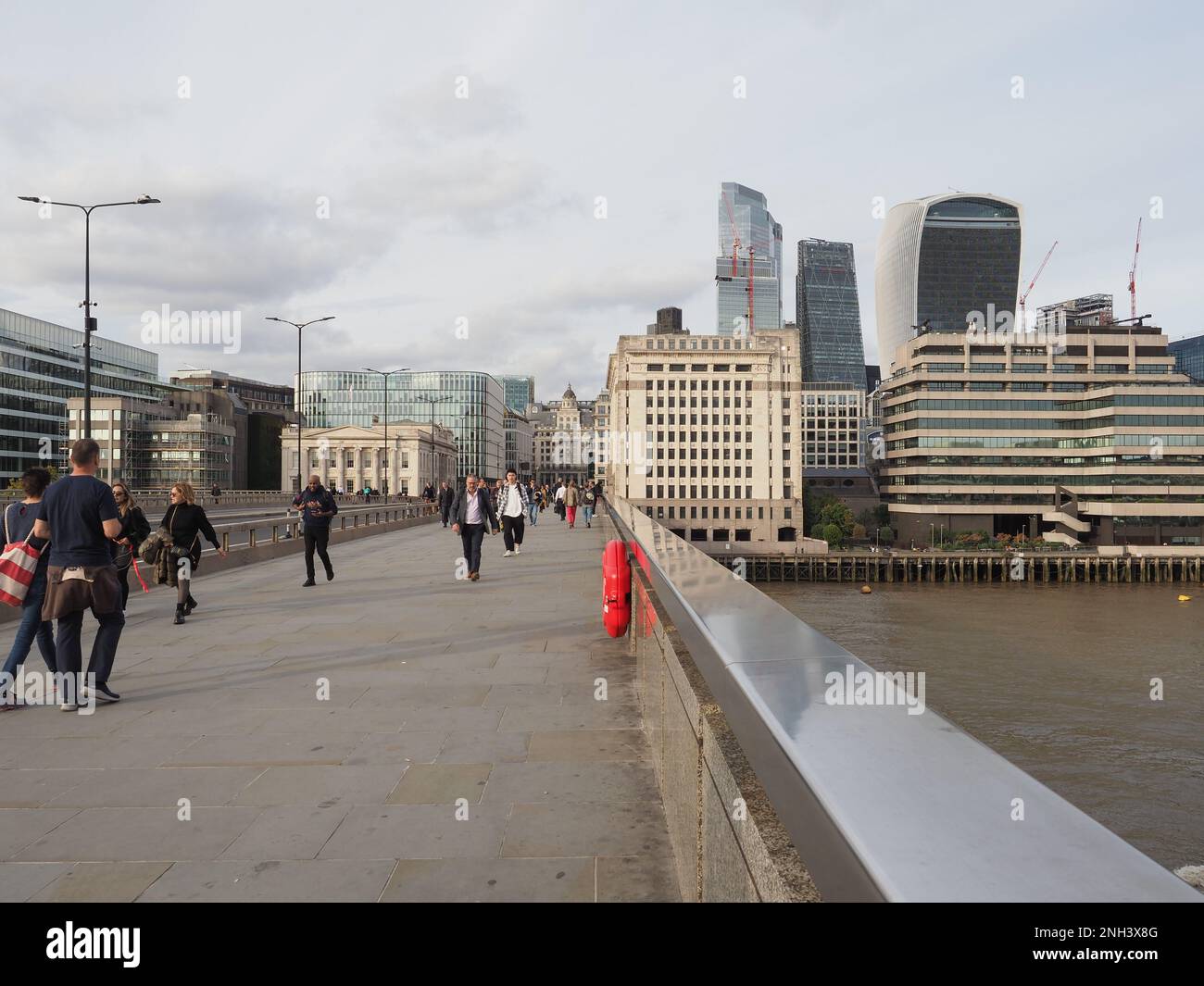 LONDON, UK - CIRCA OCTOBER 2022: People crossing London Bridge over River Thames Stock Photo - Alamy