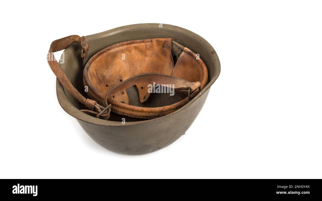 Old and used metal army helmet on a white Stock Photo - Alamy