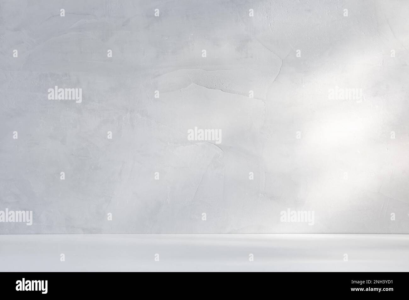 Sunlit concrete countertop and wall with natural light Stock Photo - Alamy