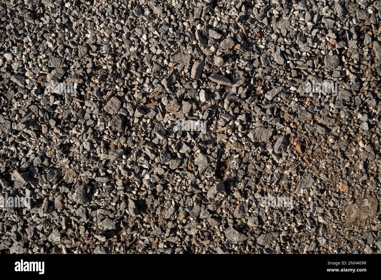 Background with small gray grit stones on the bottom Stock Photo - Alamy