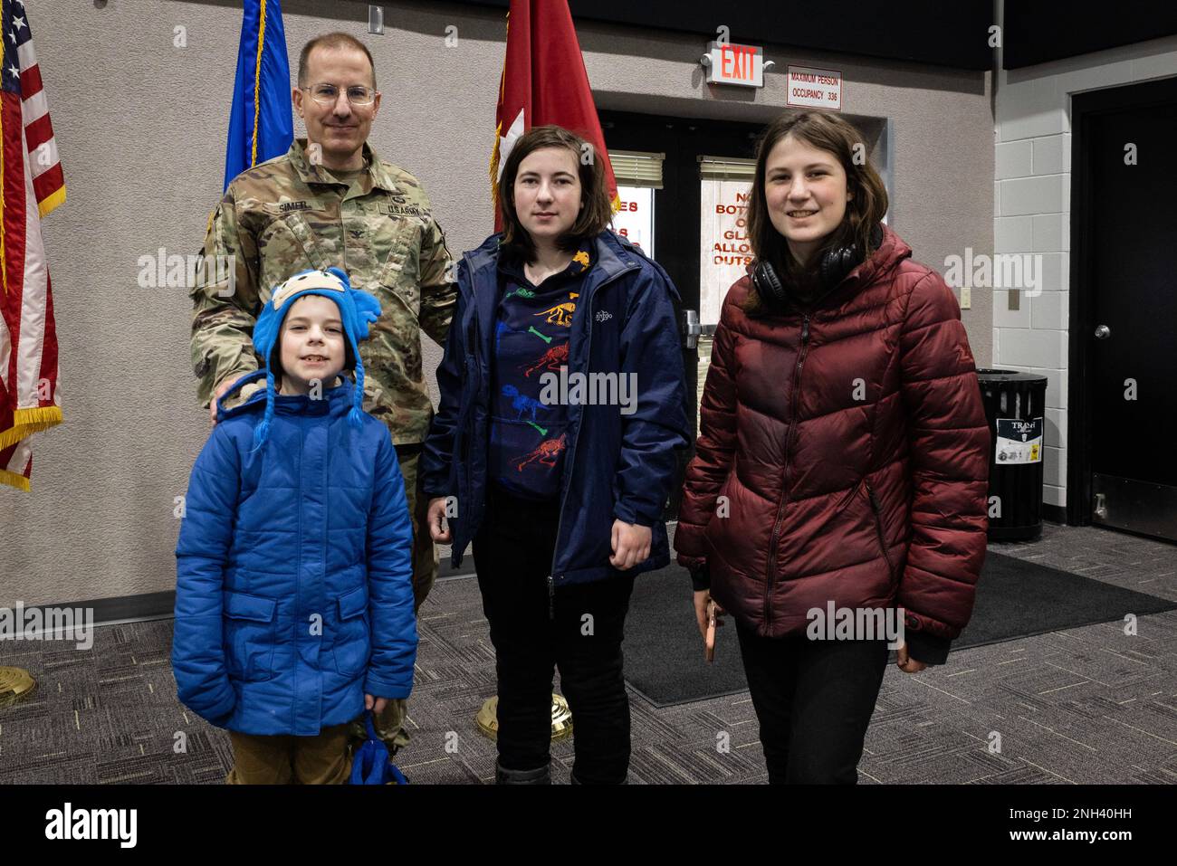 Army Col. Joshua Simer poses with his children, Amy, Brenna and Charlie ...