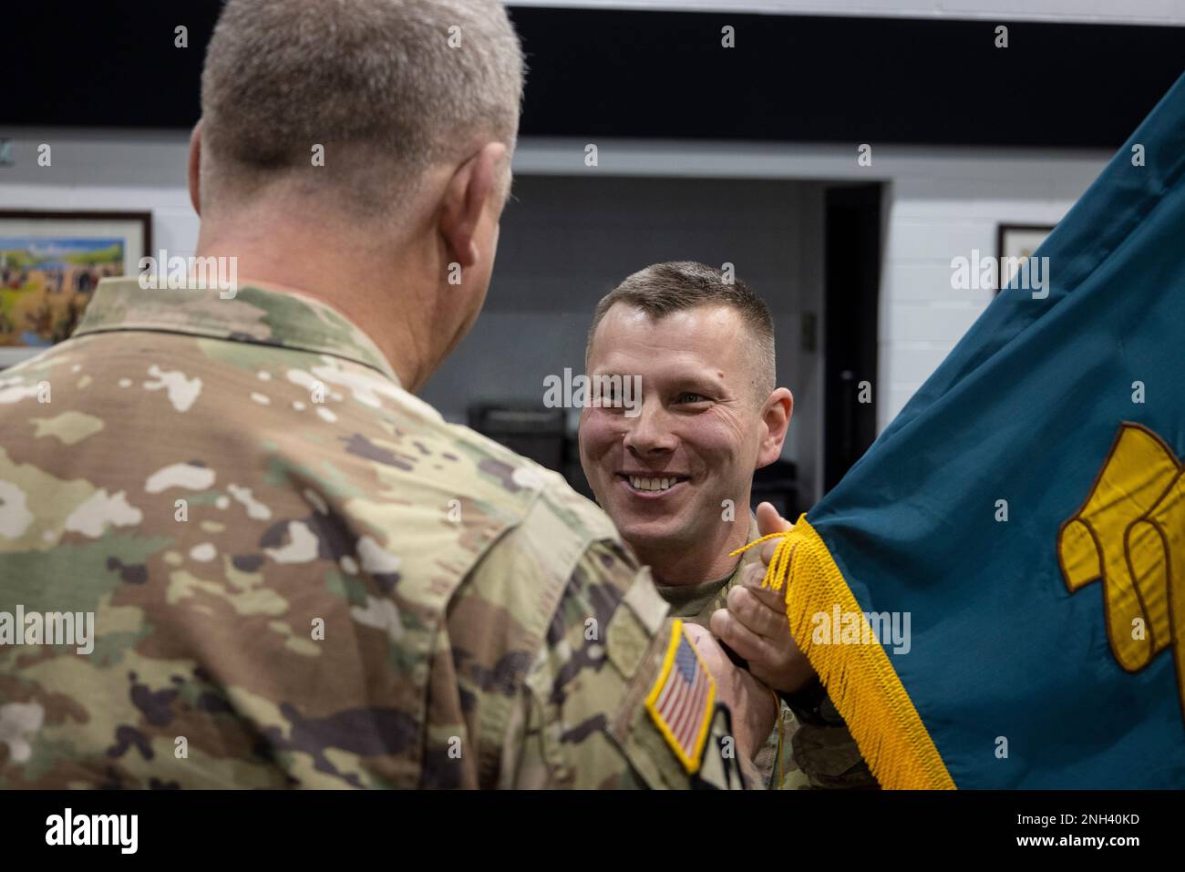 Army Col. Bryce Erickson receives the garrison colors from Brig. Gen ...