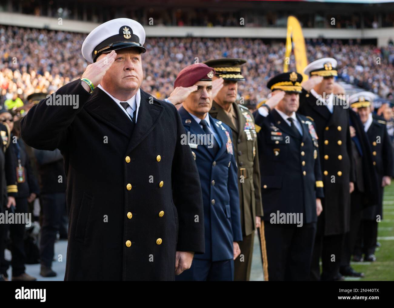 Master Chief Petty Officer of the Navy James Honea renders honors for ...