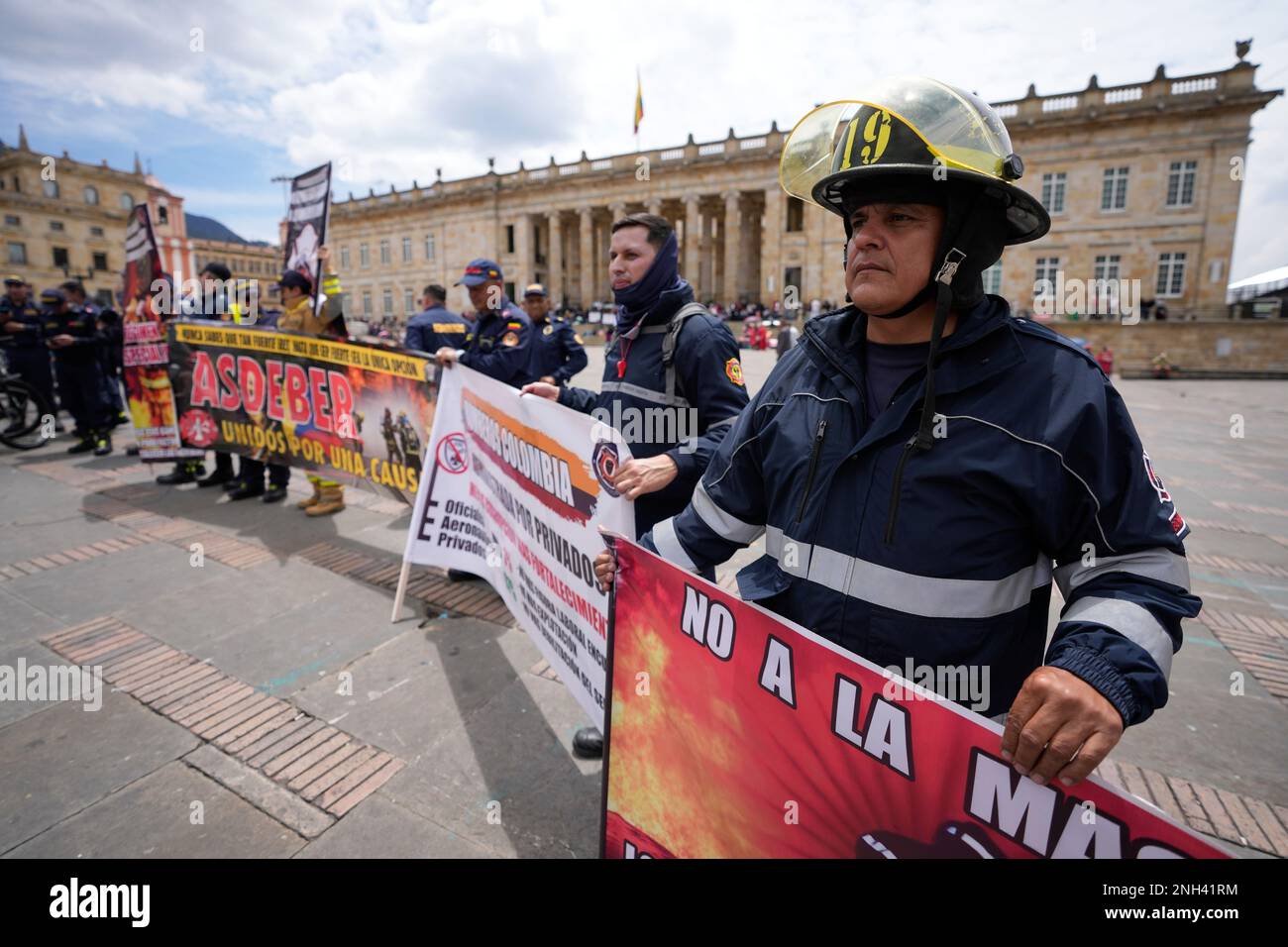 Firefighters protest for better working conditions in Plaza Bolivar in ...