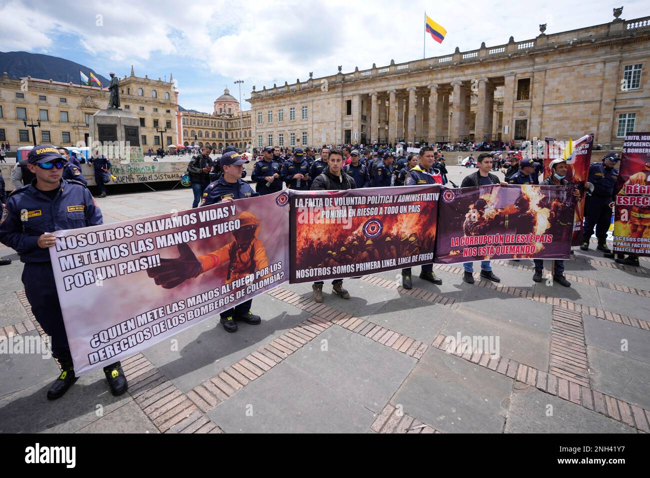 Firefighters protest for better working conditions in Plaza Bolivar in ...