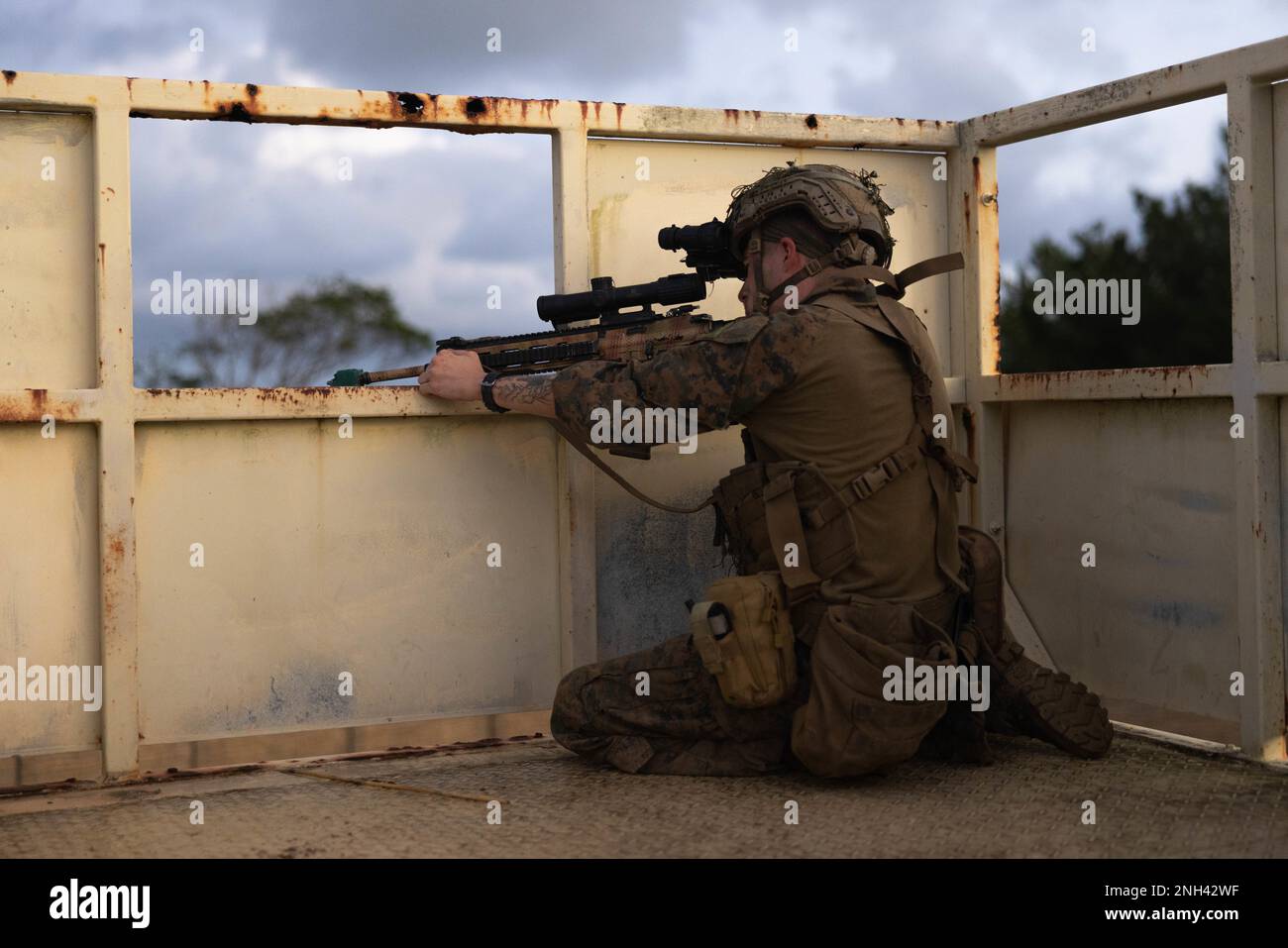 A U.S. Marine with 1st Battalion, 2nd Marines holds a defensive ...