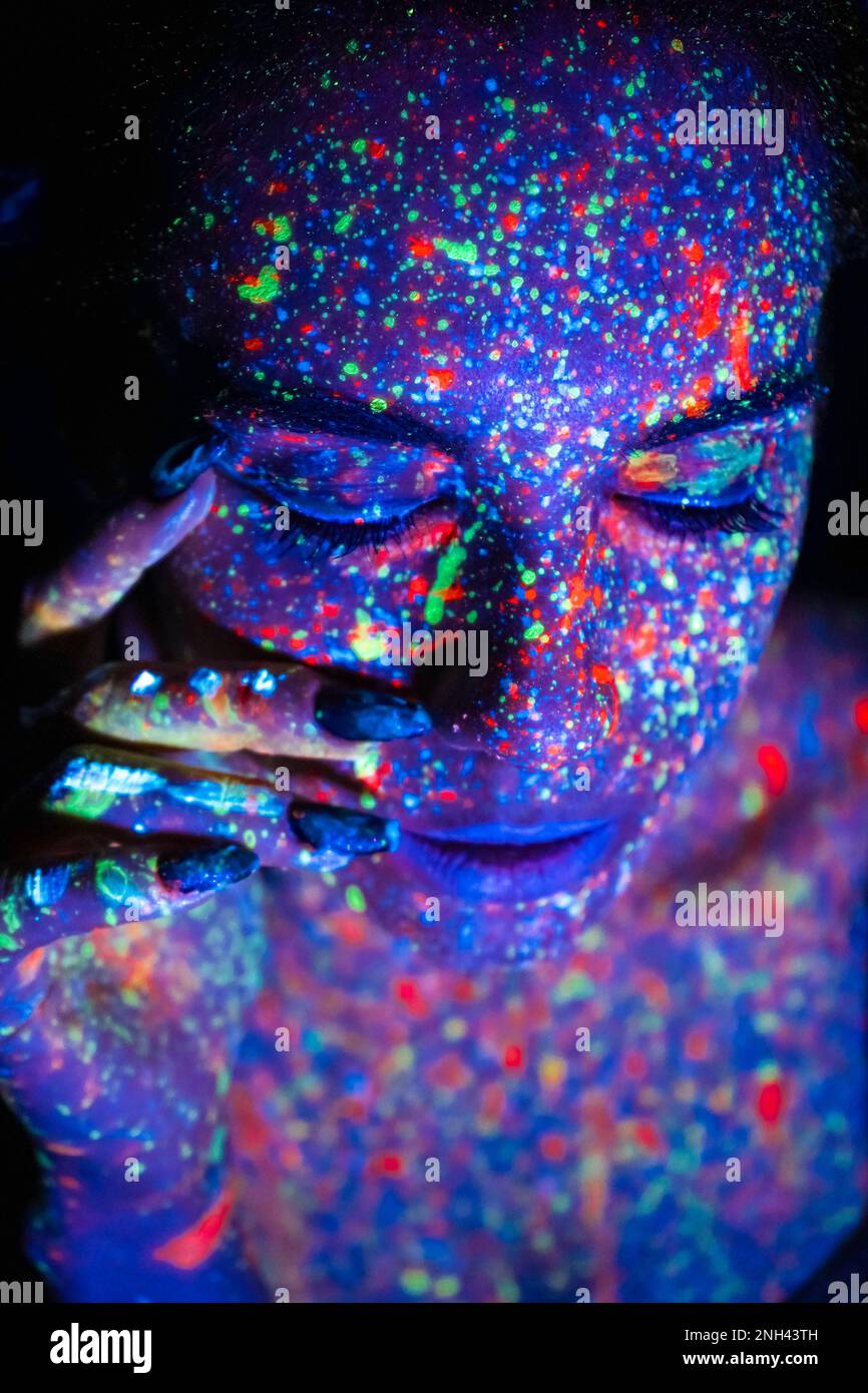 Fashion model woman in neon light, portrait of a beautiful model with ...