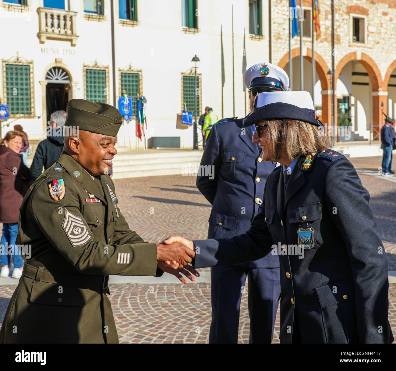 Sgt. Maj. Maurice Parker greets Italian police officer prior to the ...
