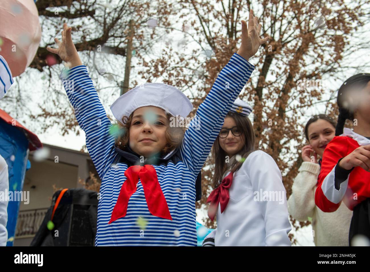 A little girl disguised as a sailor, on Popeye's masked float, during ...
