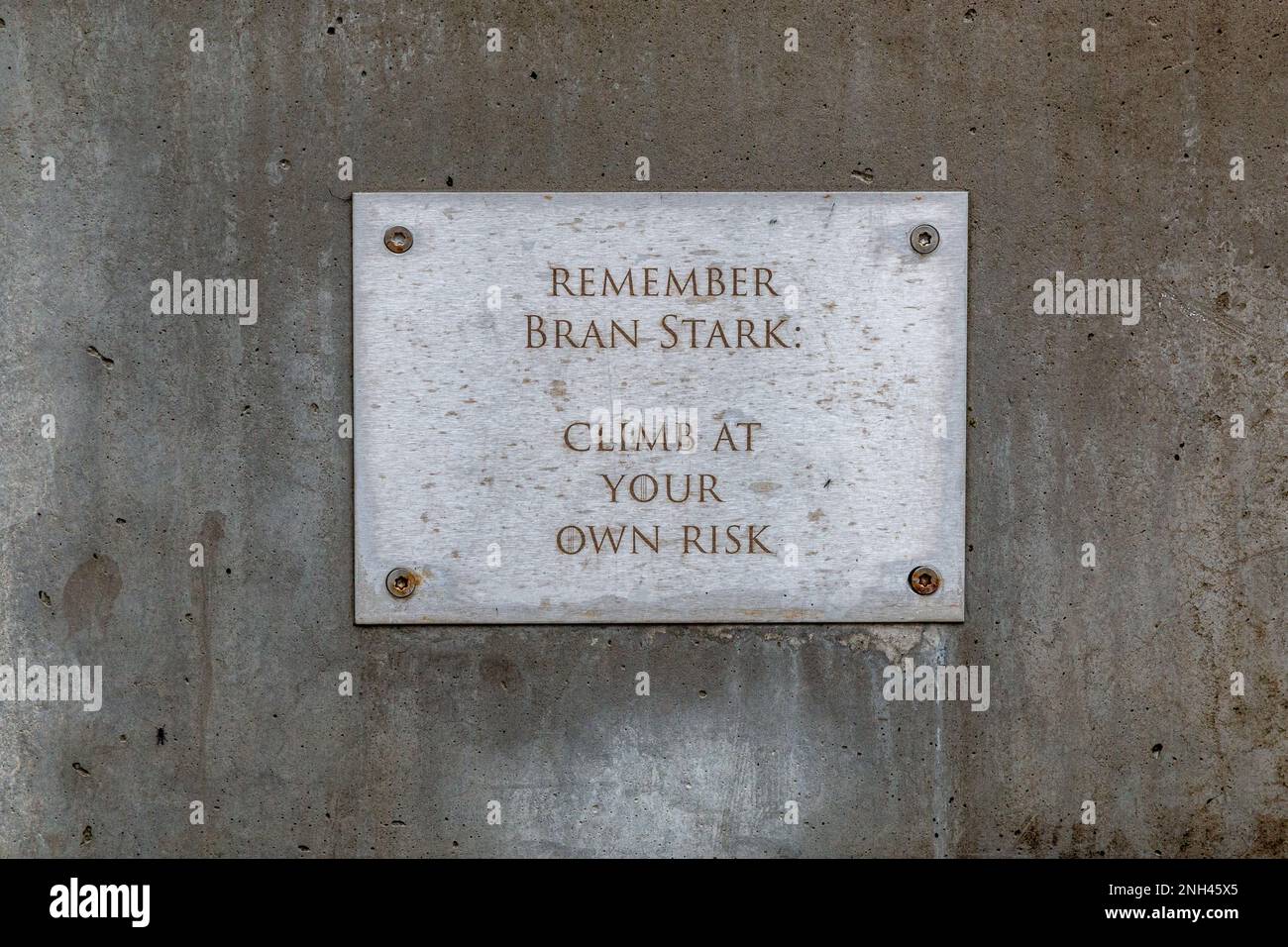 A plaque warns not to climb on a tourist attraction in the Titanic ...