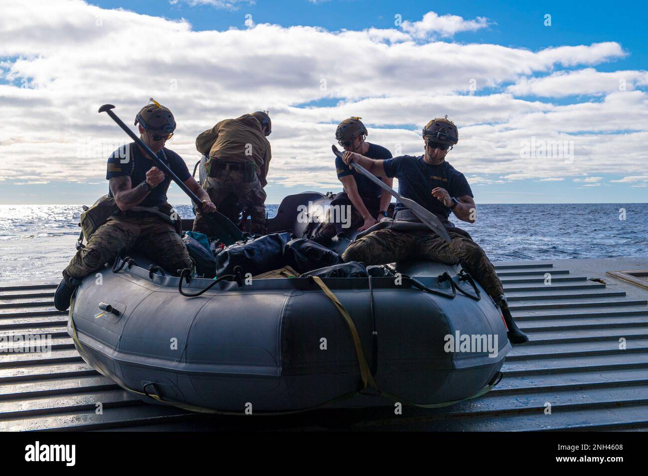 221211-N-NM271-2244 PACIFIC OCEAN (Dec. 11, 2022) Sailors attached to ...