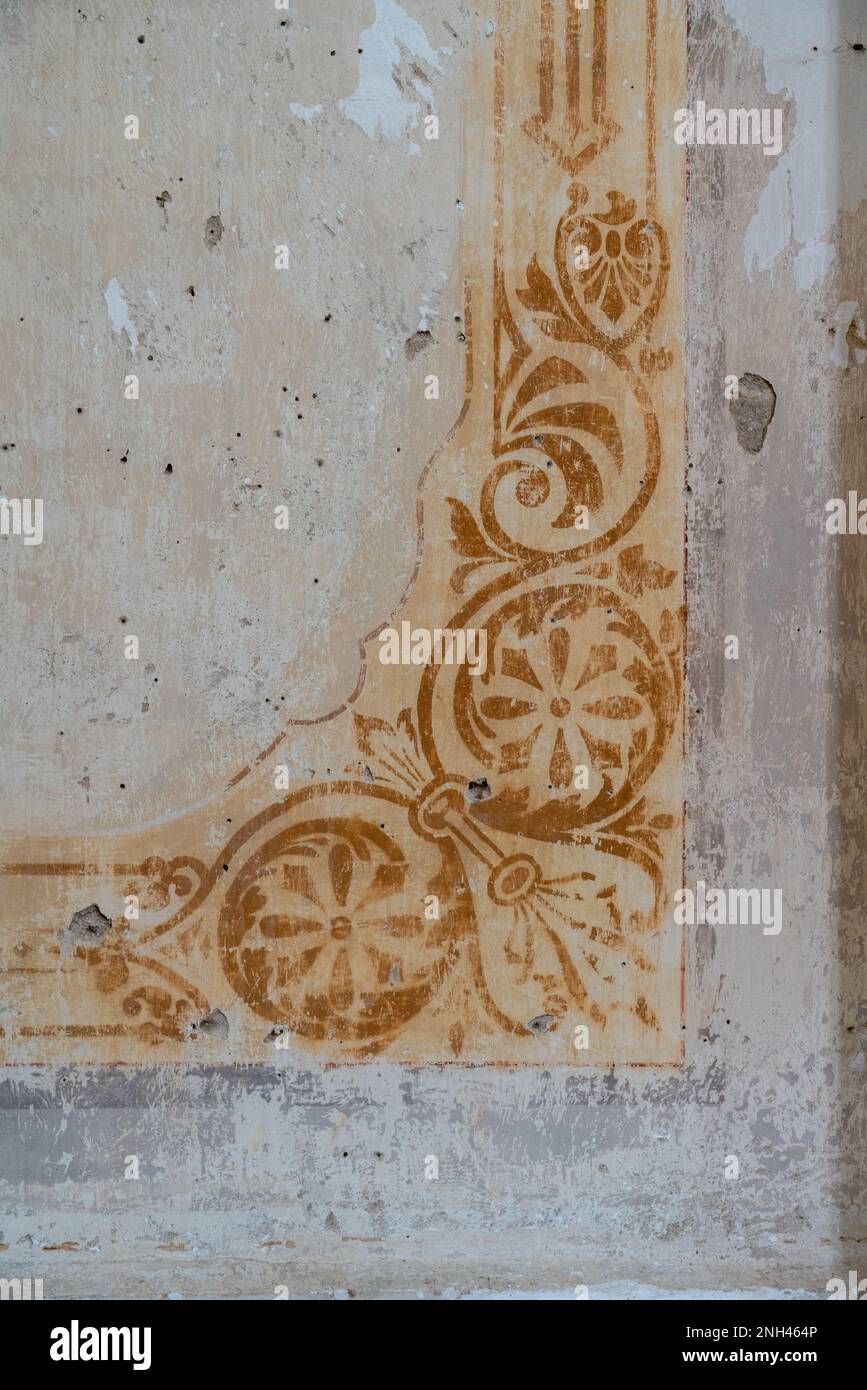 A faded fresco on a damaged plaster wall in the Church of Soledad Vista ...