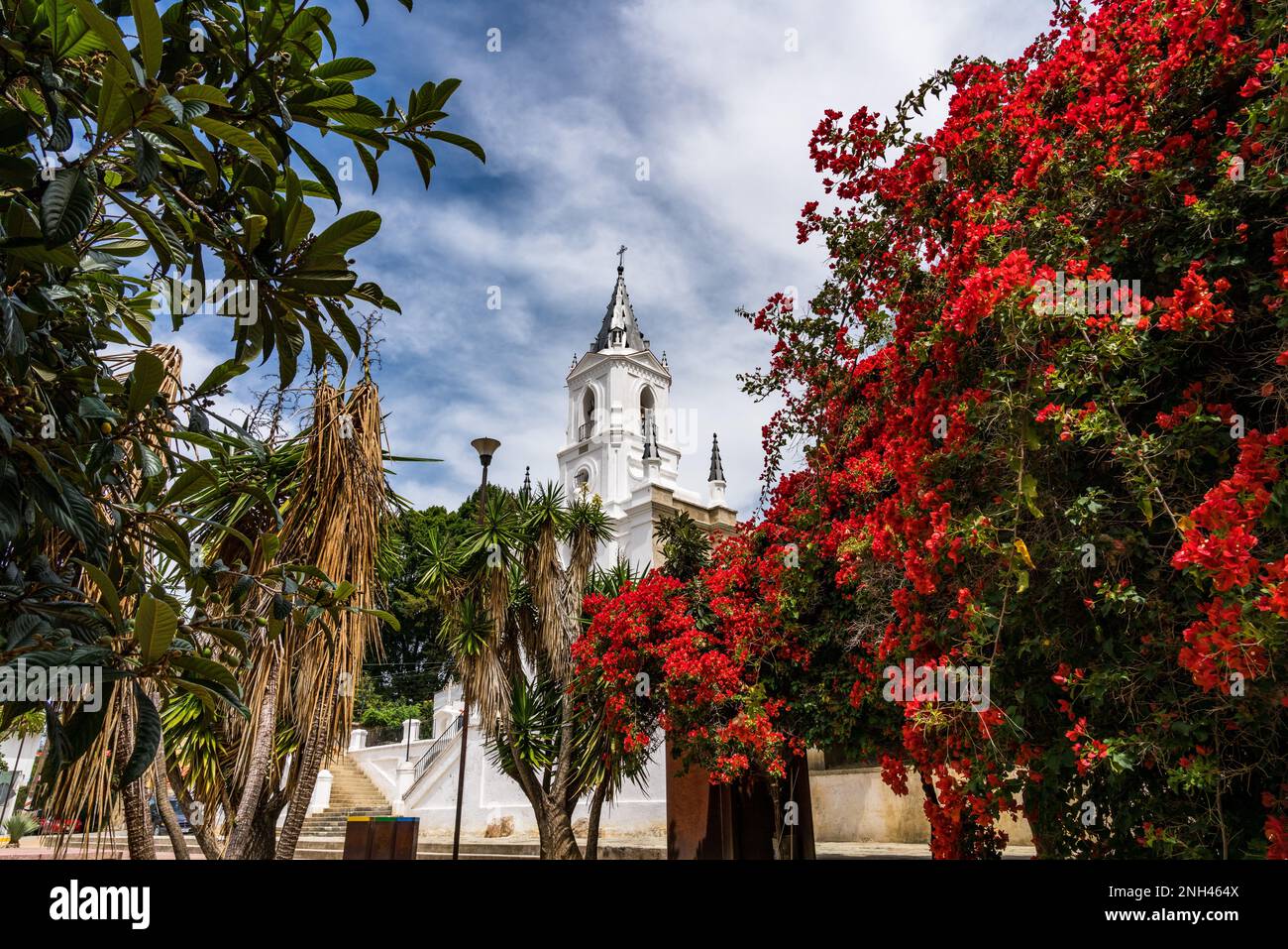 The Church of Soledad Vista Hermosa with yuccas and red bougainvilleas ...