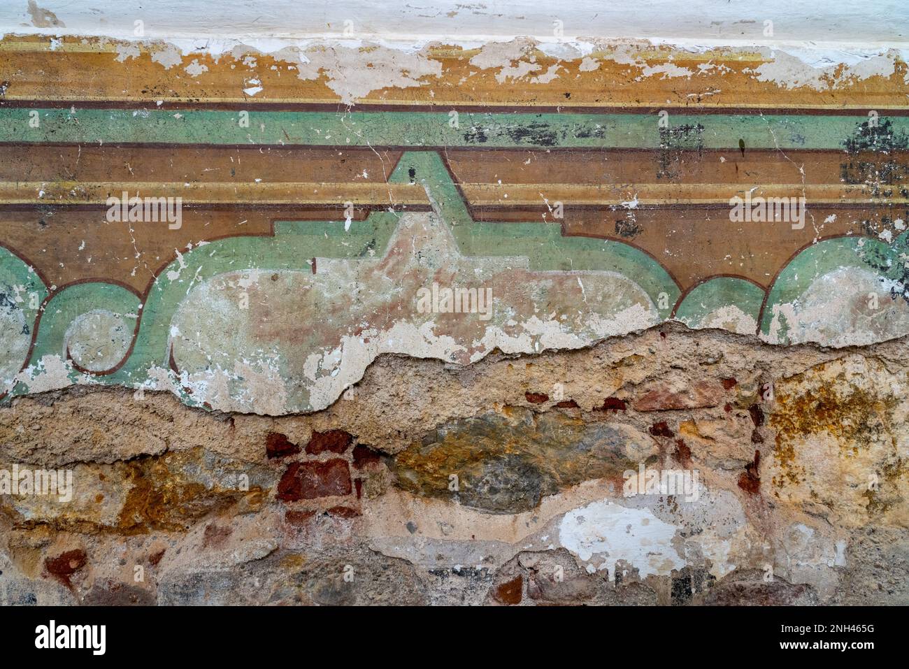 A faded fresco on a damaged plaster wall in the Church of Soledad Vista ...