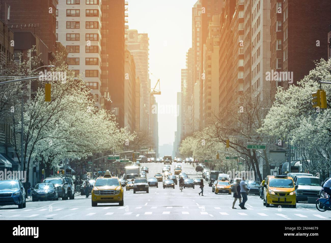 NYC cityscape street view with people, taxis and cars on 3rd Avenue in ...