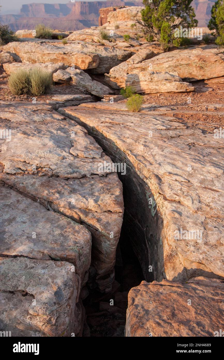 A deep curving crack in the Kayenta sandstone at Marlboro Point near ...