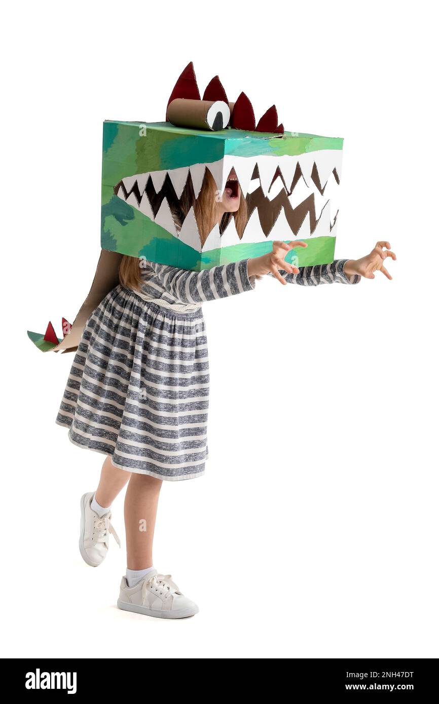 Little girl in cardboard dinosaur costume on white background Stock ...