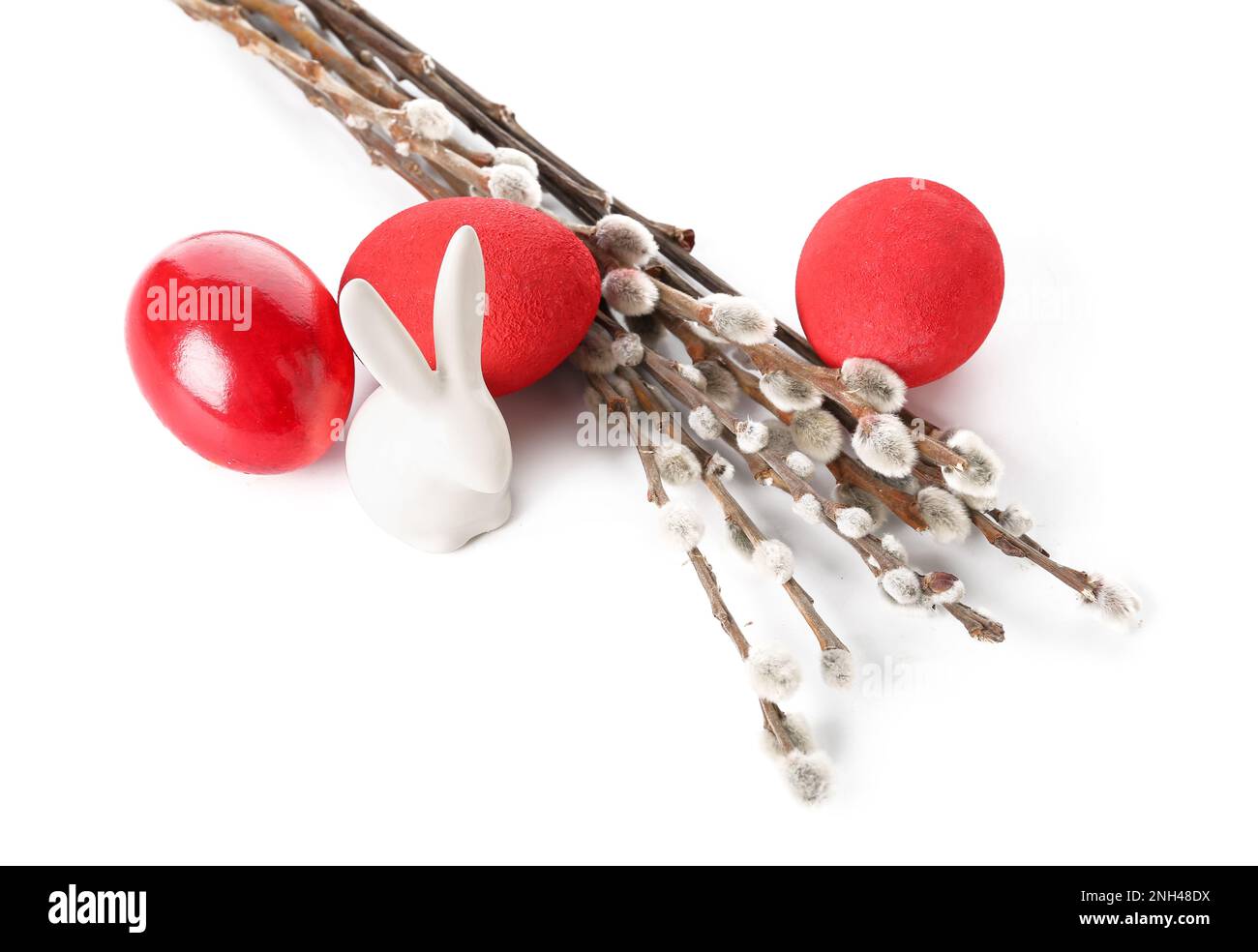 Easter eggs with rabbit and willow branches on white background Stock ...