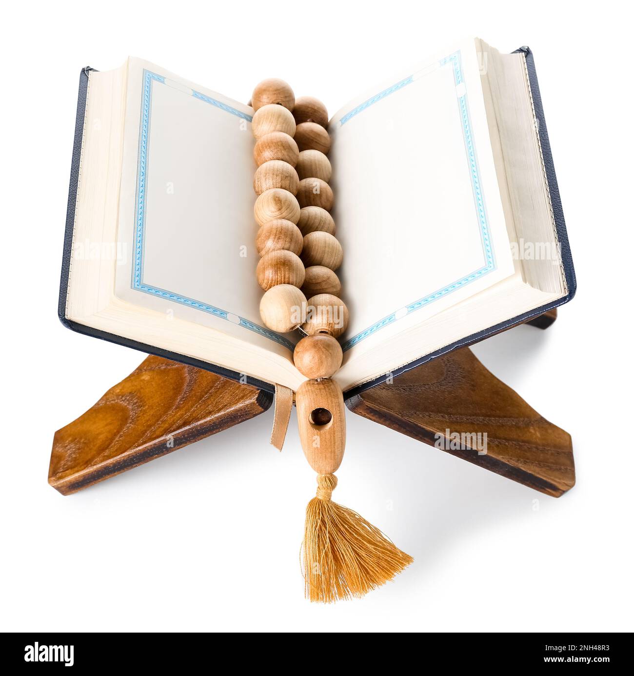 Rehal with Koran and prayer beads for Ramadan on white background Stock ...