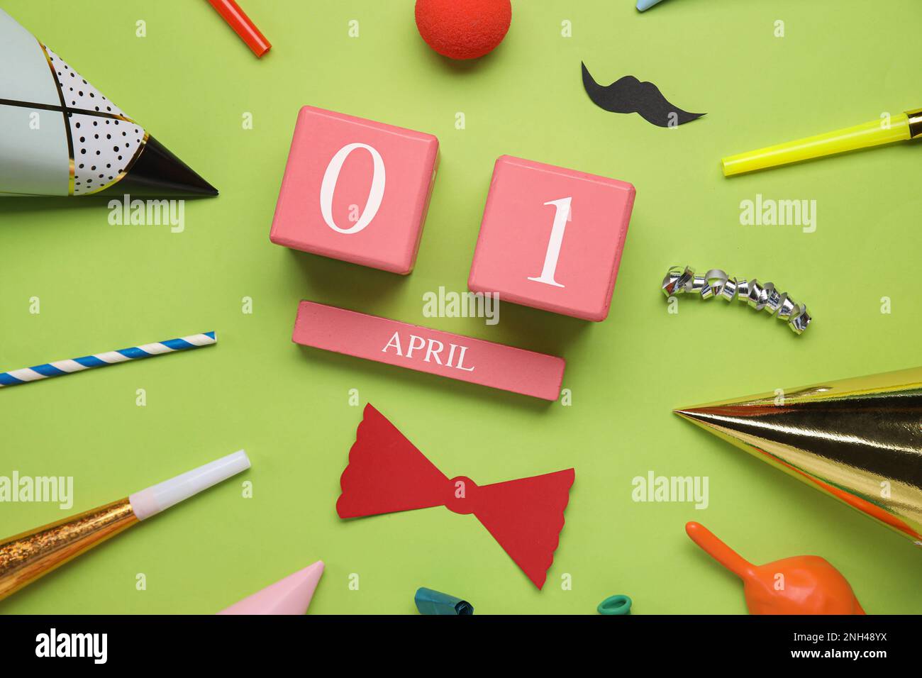 Cube calendar with date 1 APRIL and party decor for Fool's Day ...