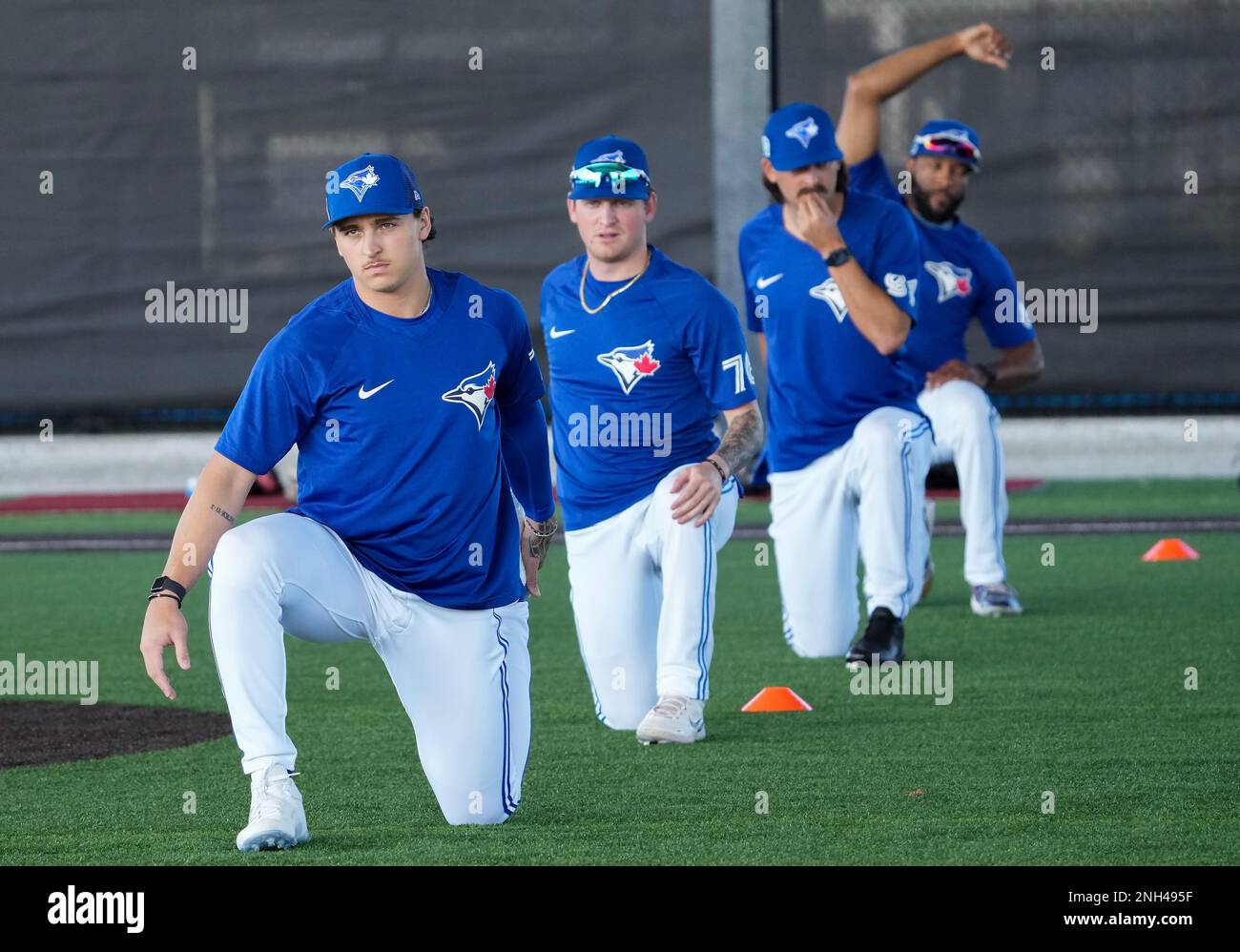 Toronto Blue Jays pitcher Ricky Tiedemann, front, warms up during ...