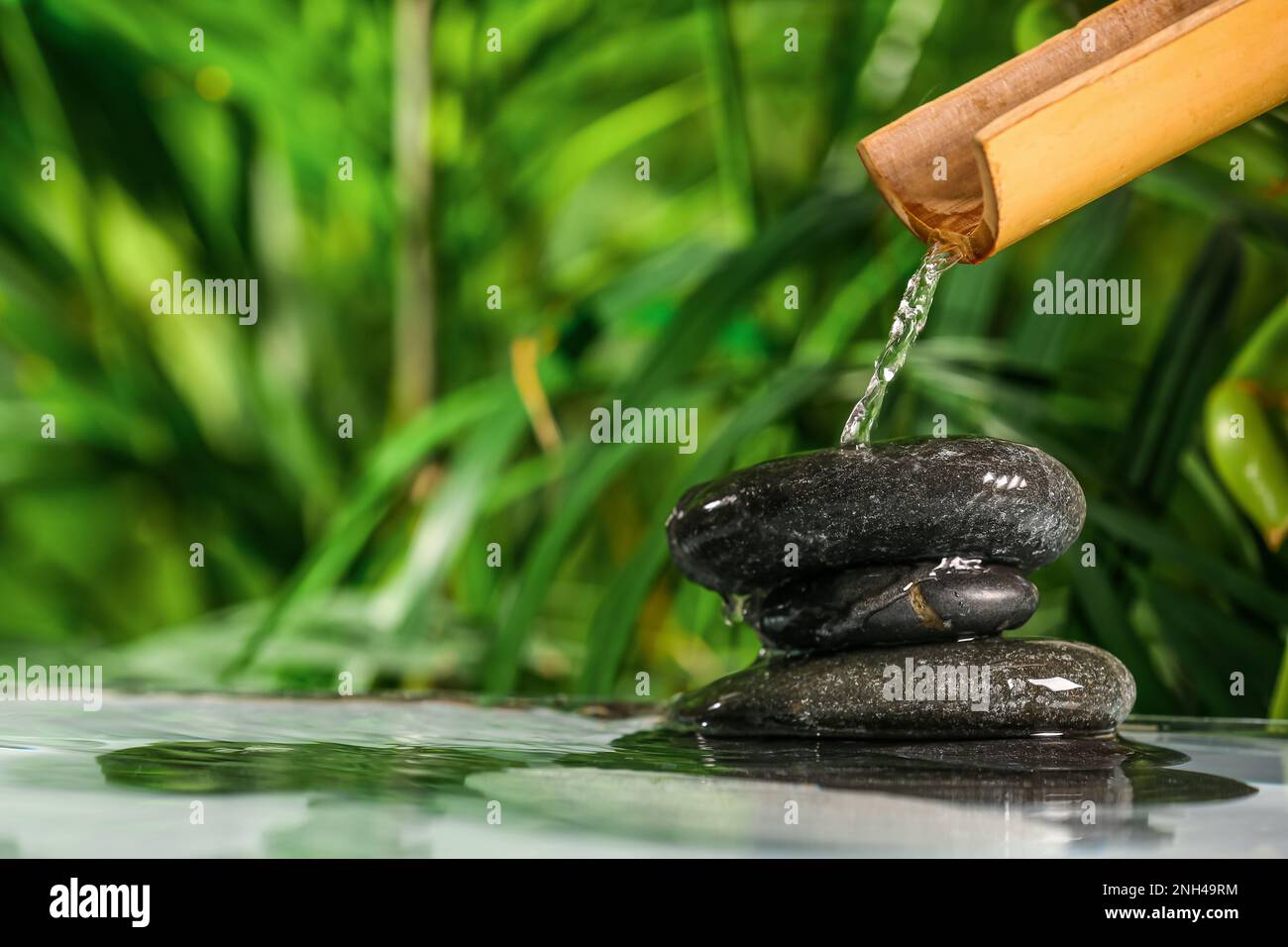 Water pouring on stack zen hi-res stock photography and images - Alamy