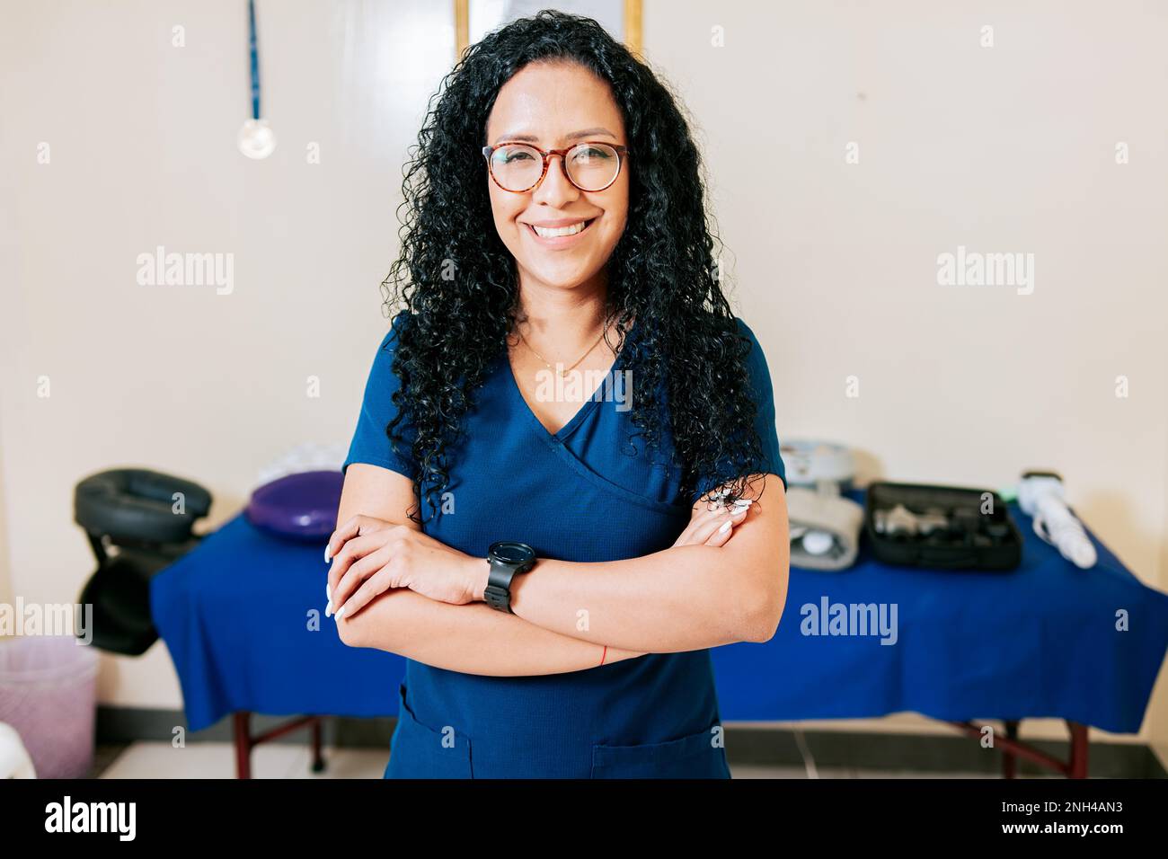 Crossed arms african american physical therapist woman. Smiling woman ...