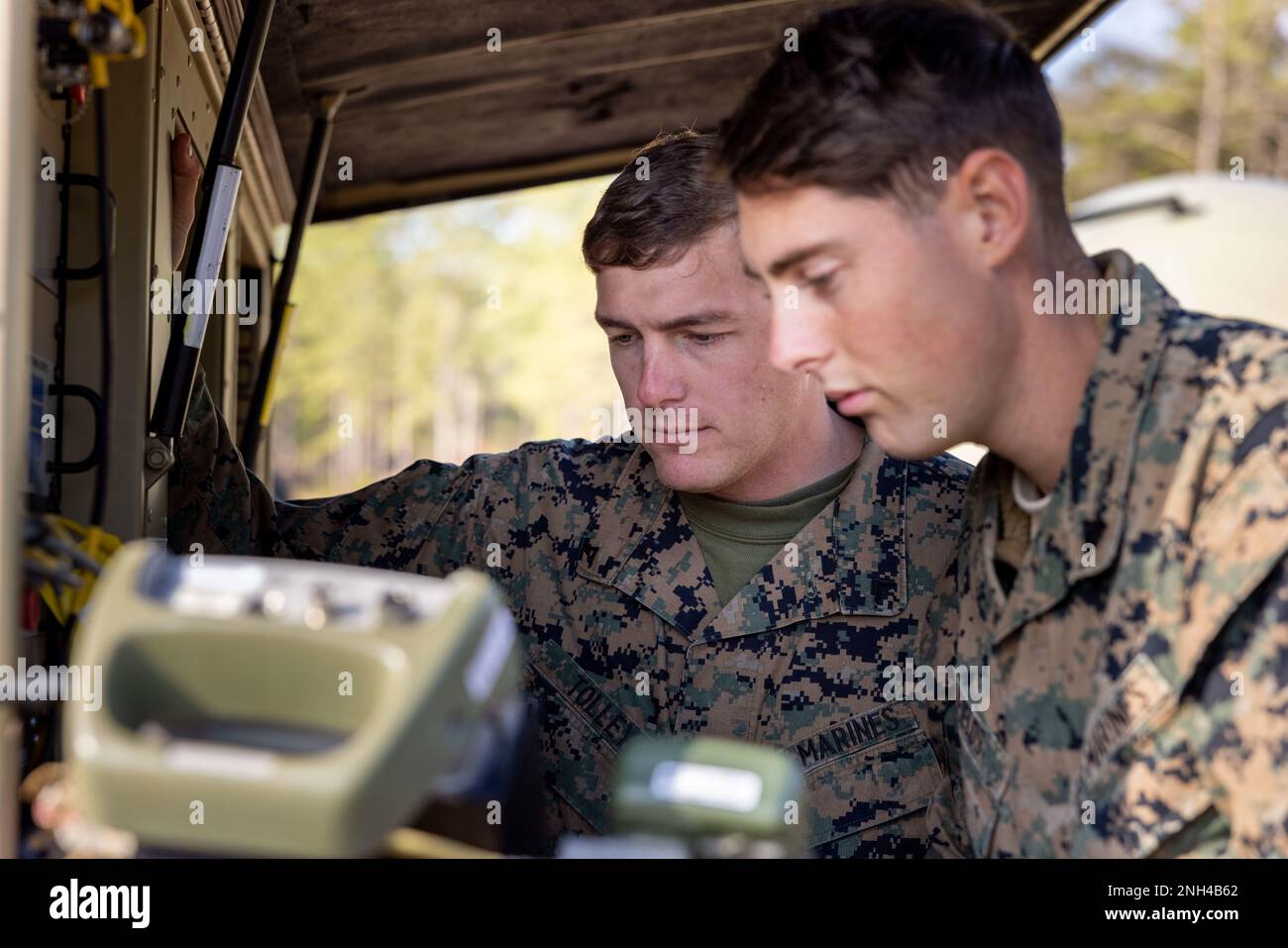 U.S. Marine Corps Lance Cpl. Grady Tolley, left, and Cpl. Matthew ...