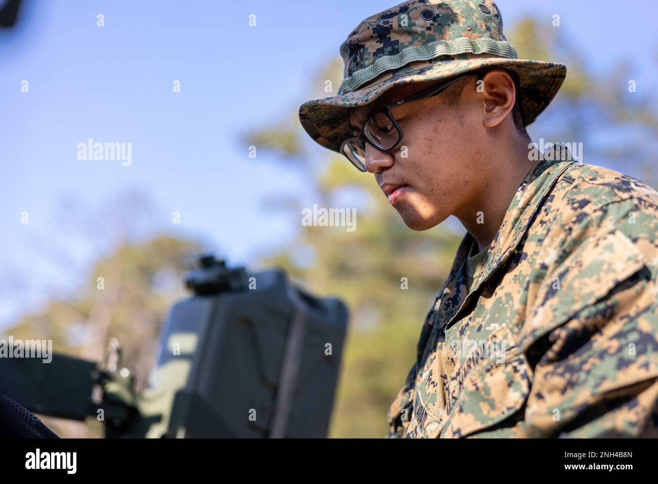 U.S. Marine Corps Lance Cpl. Alvin Baladad, a satellite transitions ...