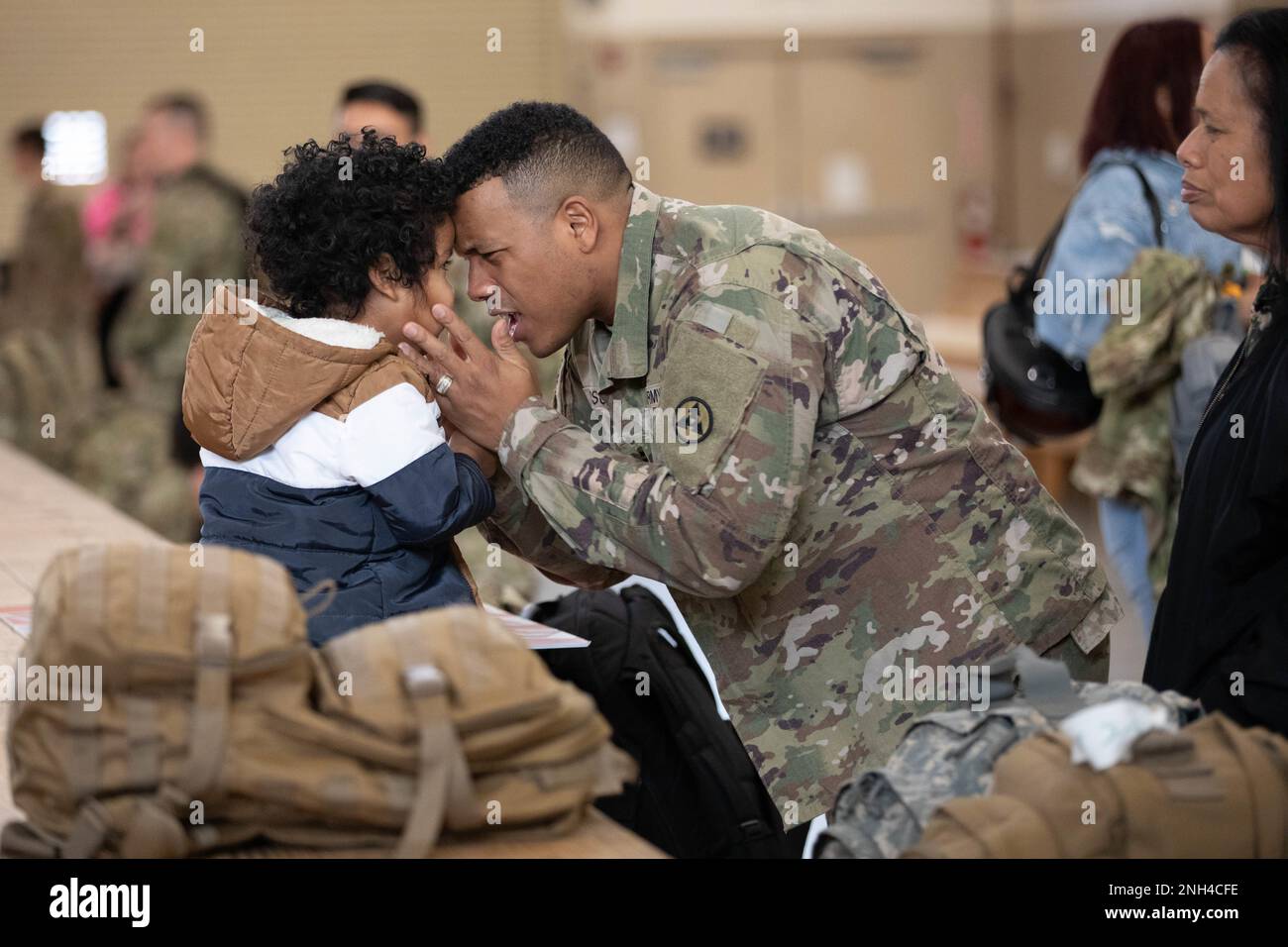 U.S Army Soldier from 330th Movement Control Battalion plays with son ...