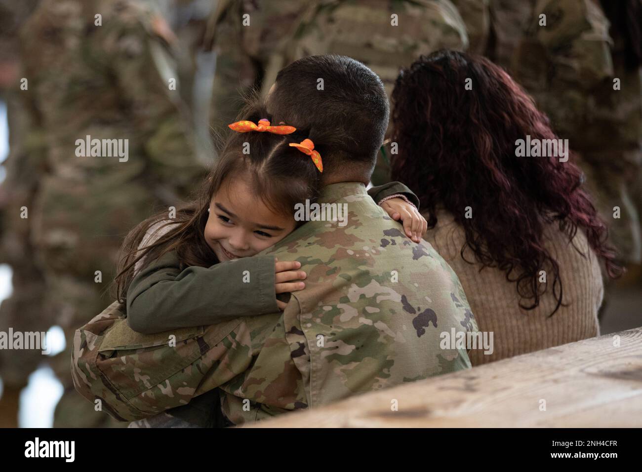 U.S Army soldier from 330th Movement Control Battalion embraces ...