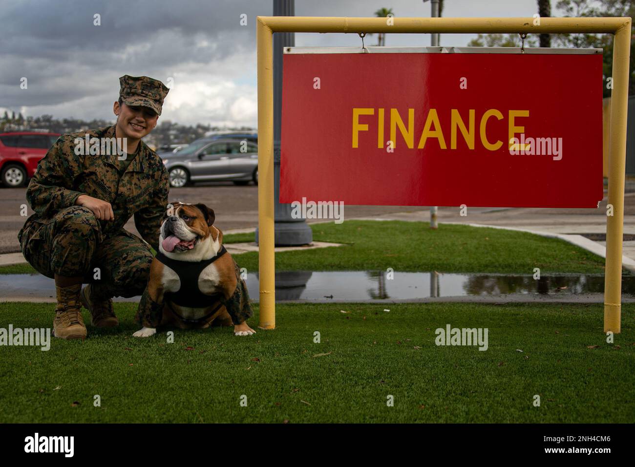 U.S. Marine Corps Cpl. Manny, right, the mascot of Marine Corps Recruit ...