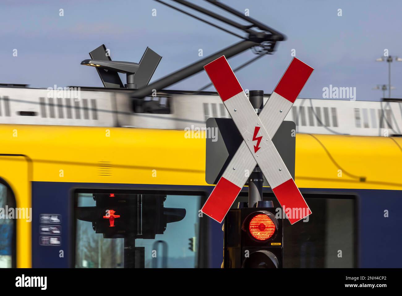 Unrestricted level crossing, St. Andrews cross with warning light and a ...