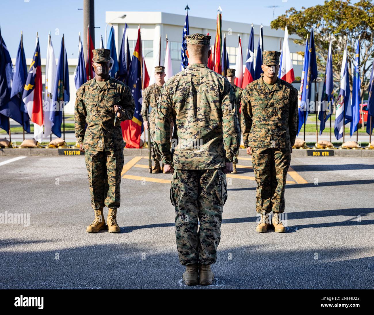 U.S. Marine Corps Lt. Col. Clint W. Alanis(center), commanding officer ...