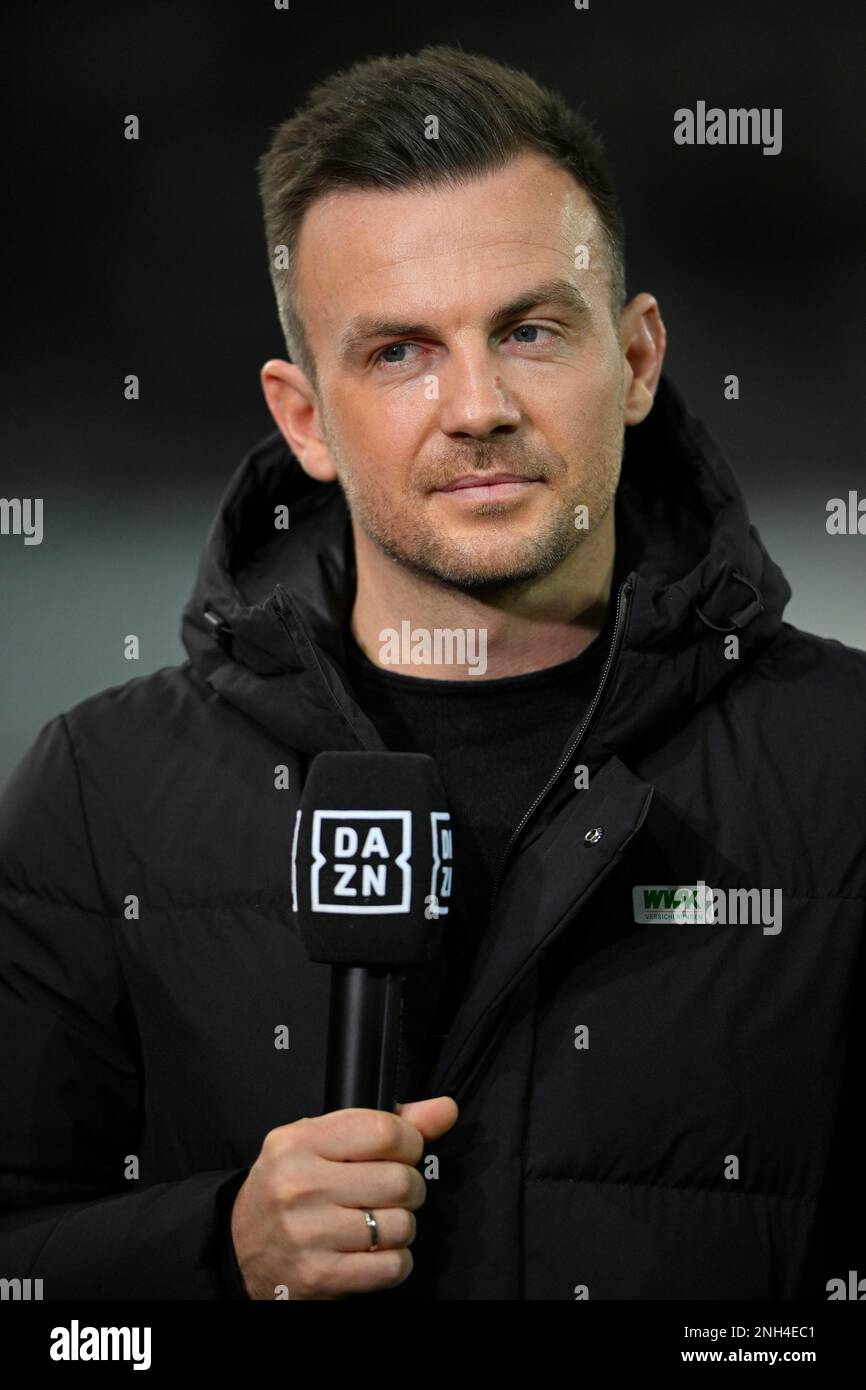 Coach Enrico Maassen FC Augsburg FCA in interview with microphone logo ...
