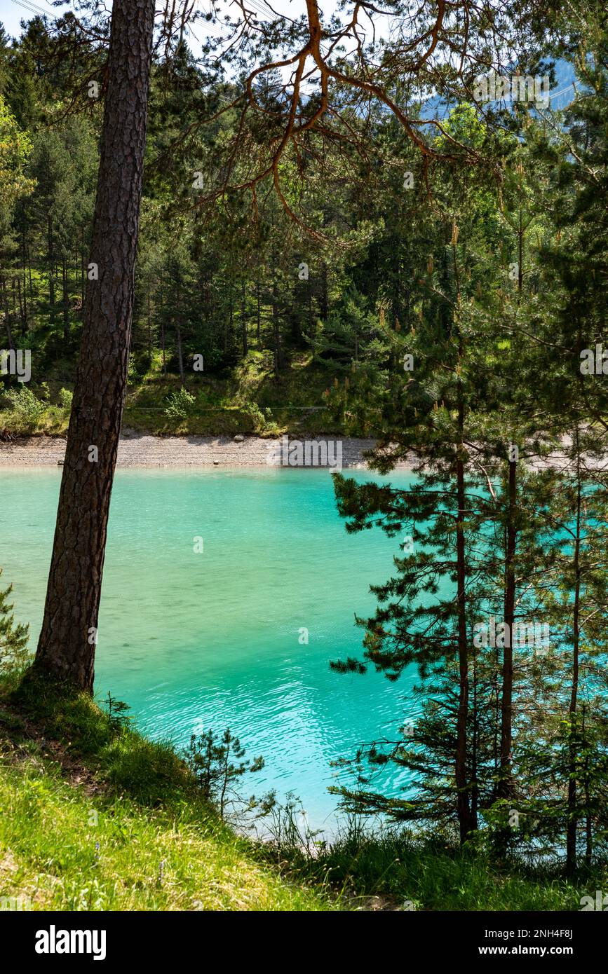 View over the turquoise blue Uri lake, Reutte, Austria Stock Photo - Alamy