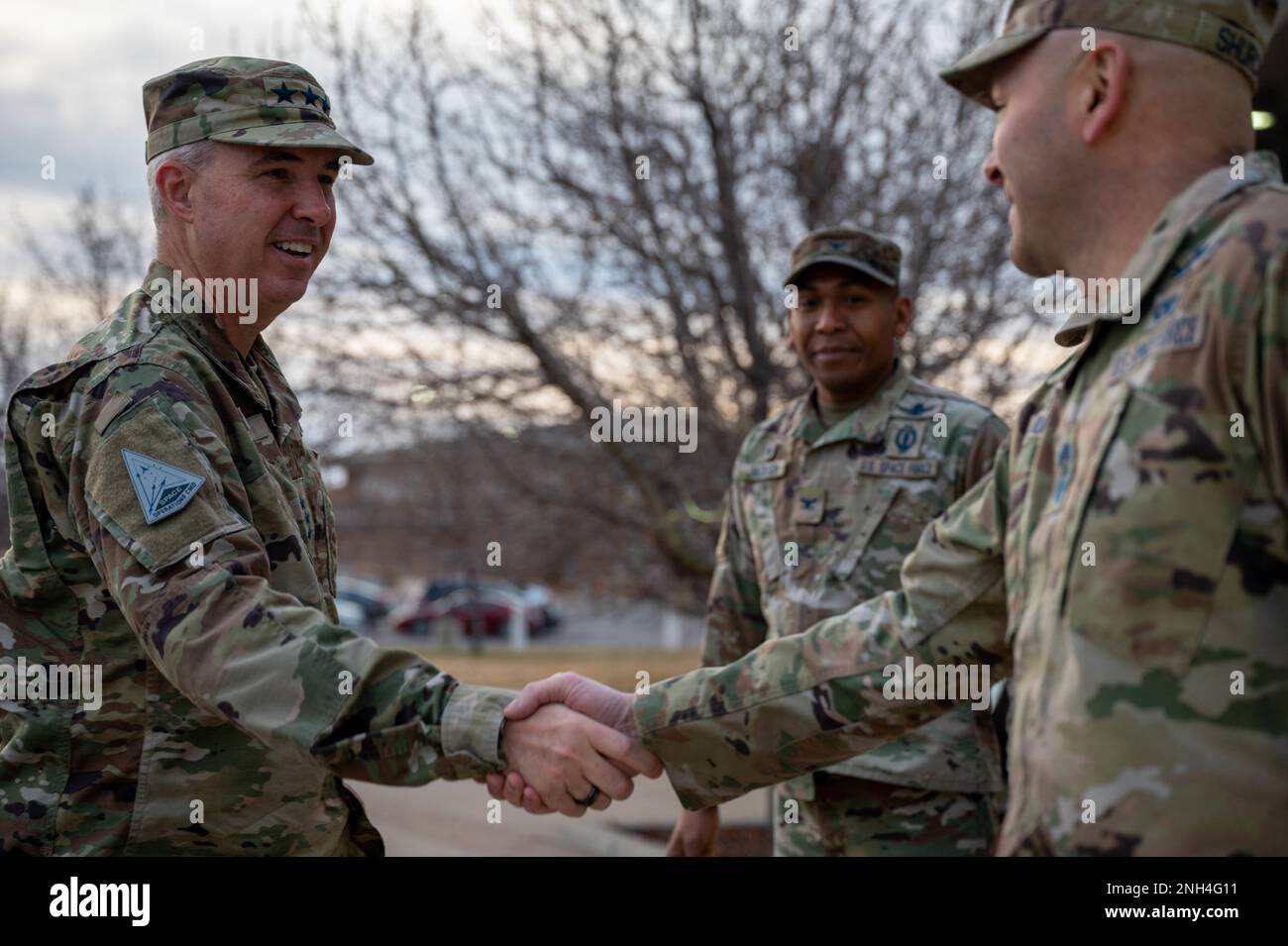 Lt. Gen. Stephen Whiting, commander of Space Operations Command, left ...